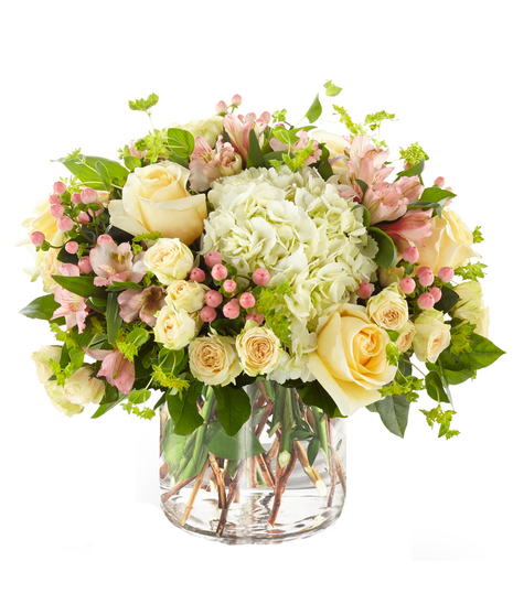 Pastel Splendor features pastel hydrangea, roses, spray roses, lilies ...