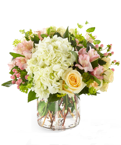 Pastel Splendor features pastel hydrangea, roses, spray roses, lilies ...